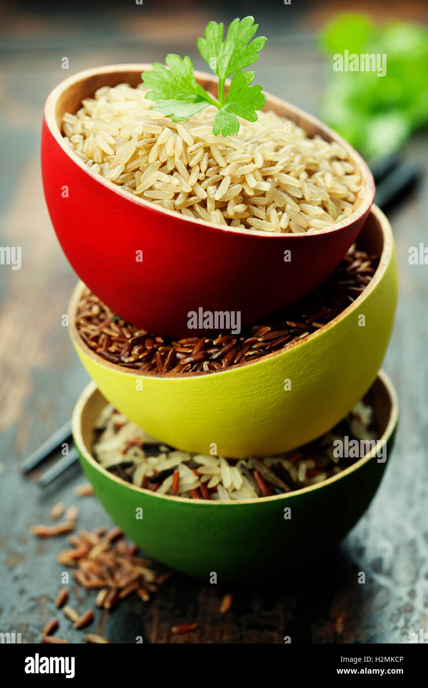 bowls of uncooked rice Stock Photo - Alamy