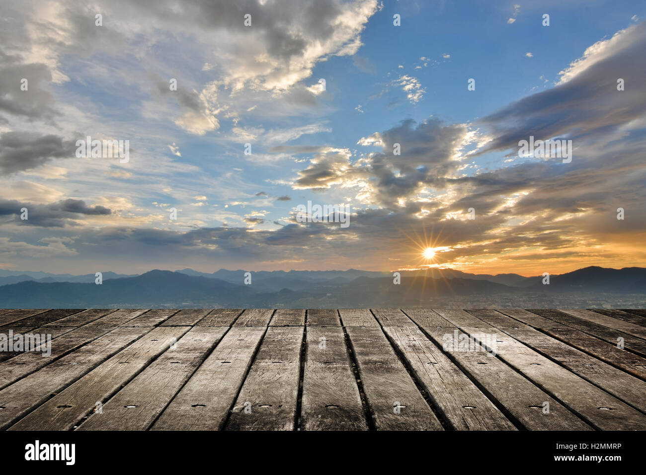 City sunset with wooden ground Stock Photo - Alamy