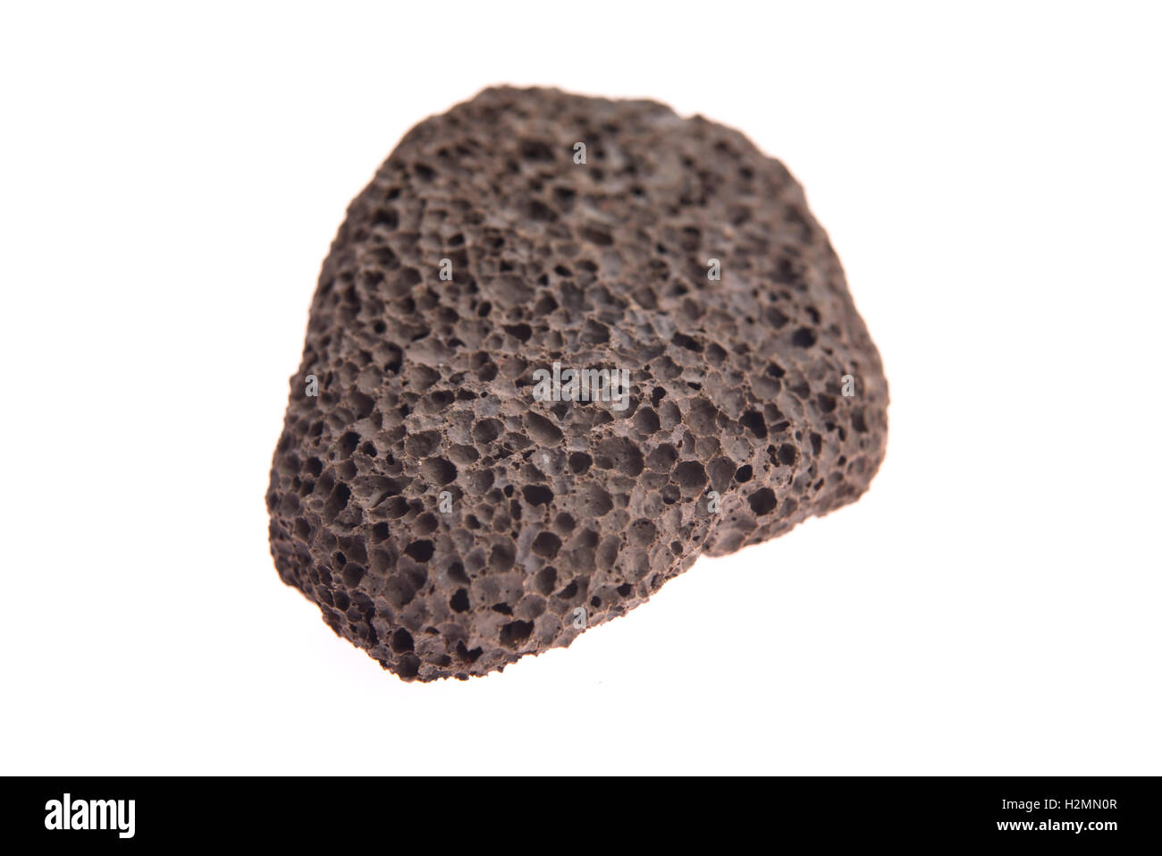 Pumice stone isolated on white background Stock Photo - Alamy