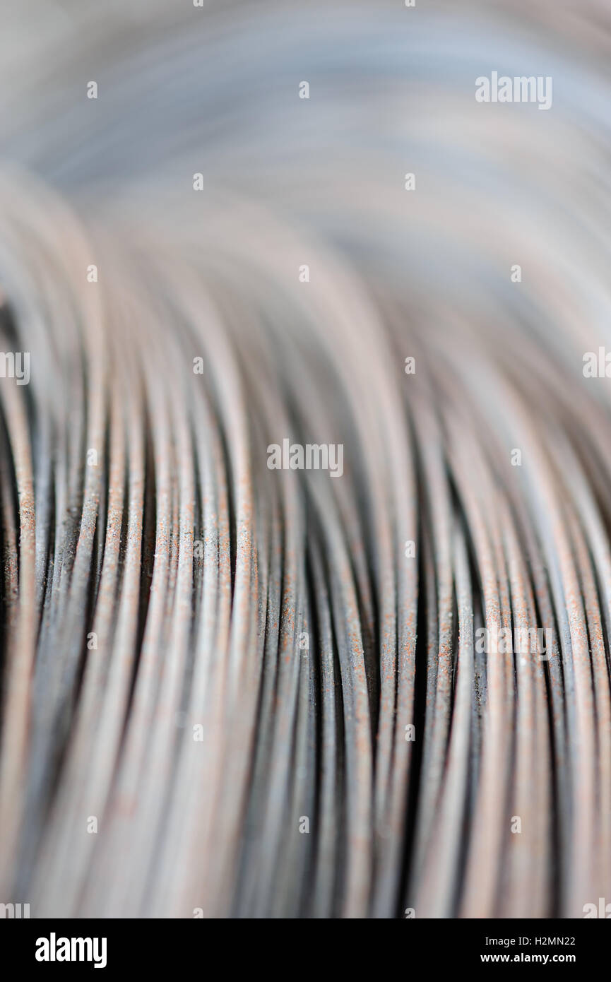 hank of metal wire background Stock Photo - Alamy