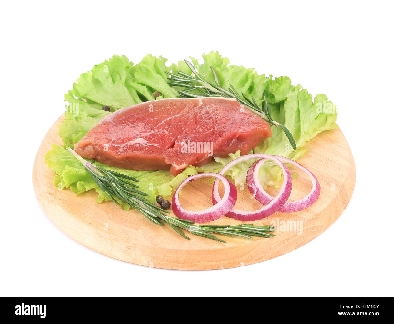 Raw beef steak on platter Stock Photo - Alamy