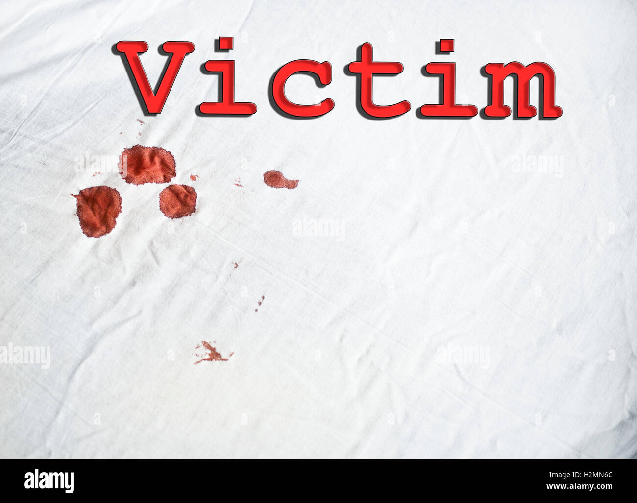 Victim sign on white sheet with blood Stock Photo - Alamy