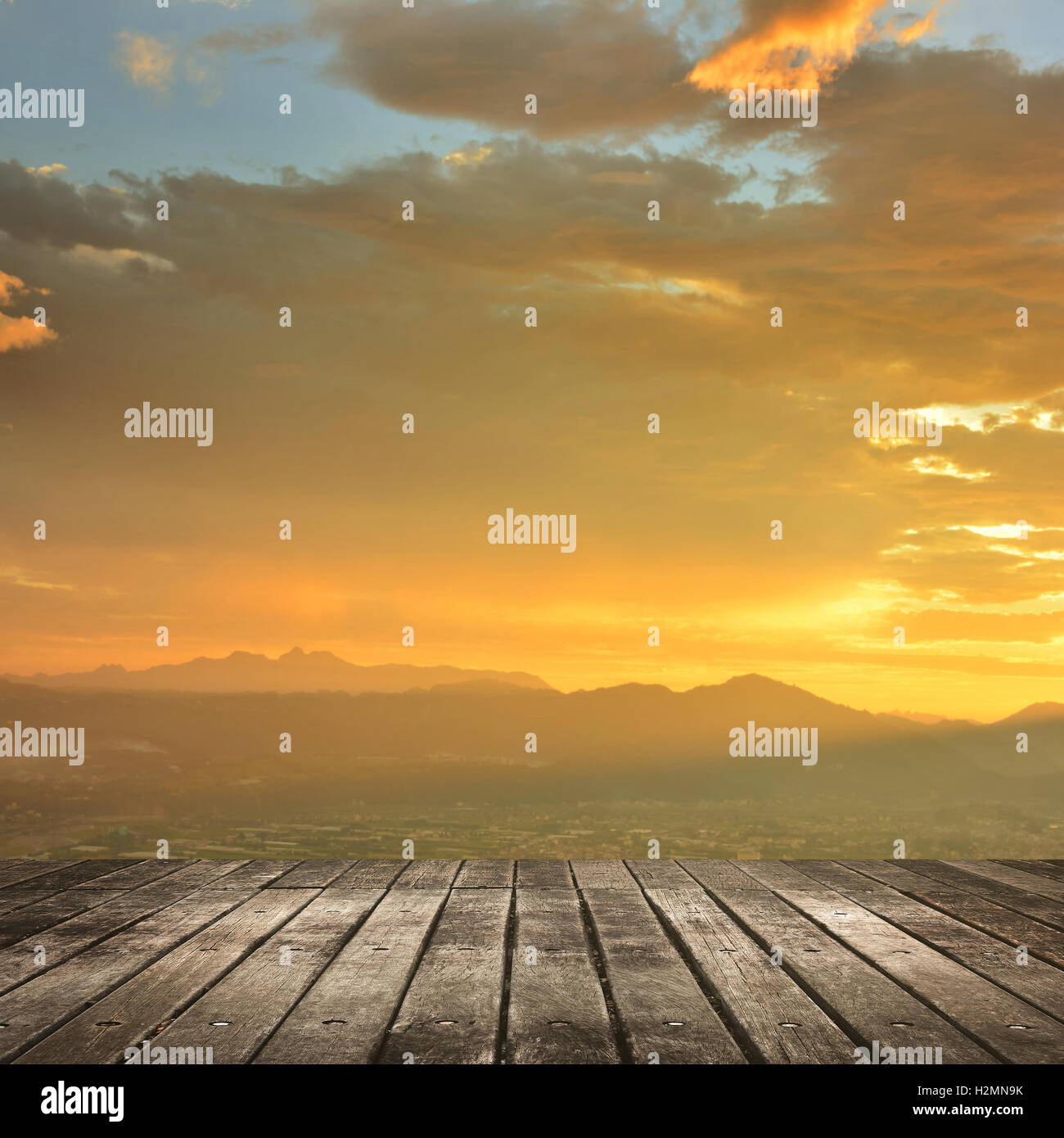 City sunset with wooden ground Stock Photo - Alamy