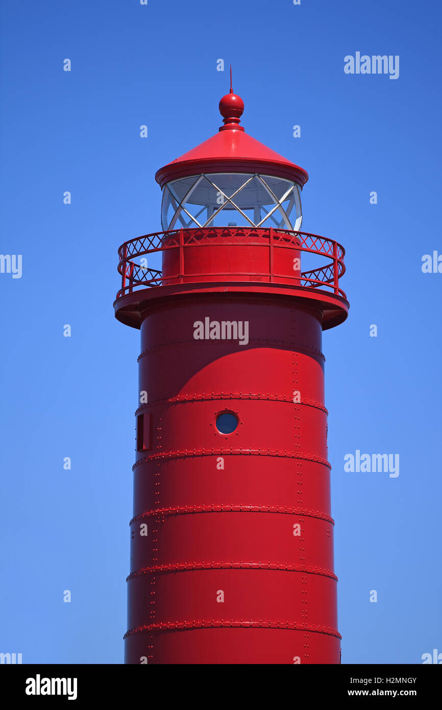 Red lighthouse over blue sky during daytime Stock Photo - Alamy