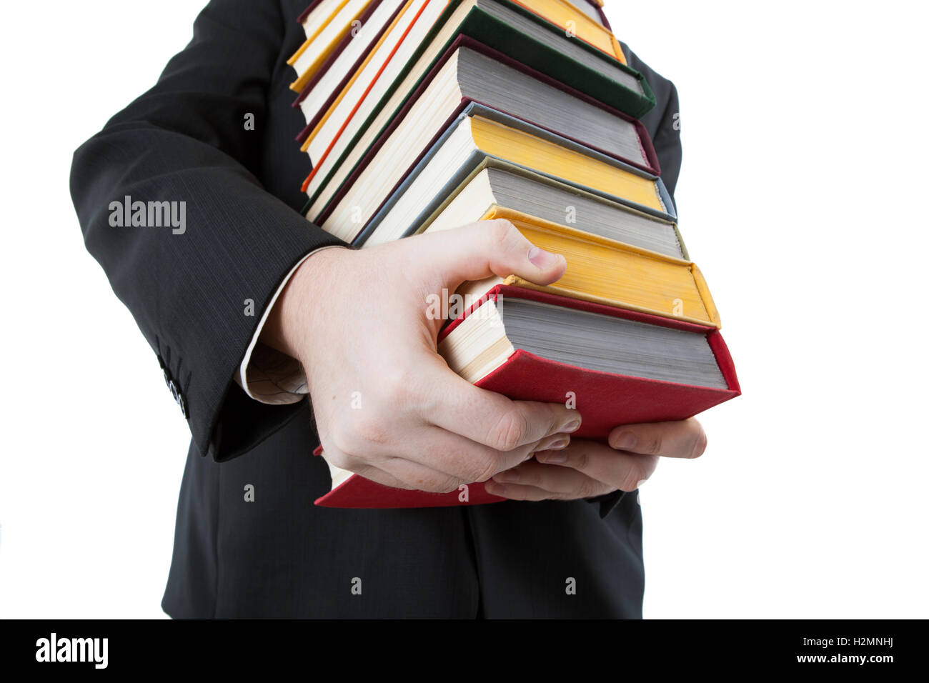 man holding a stack of books Stock Photo - Alamy