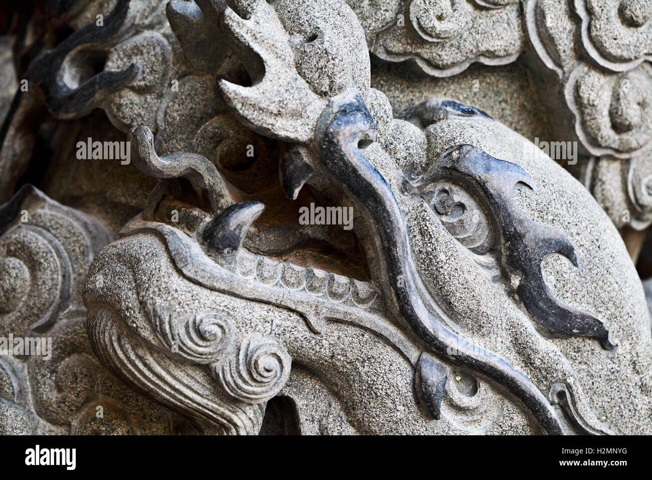 Dragon stone statue Stock Photo - Alamy