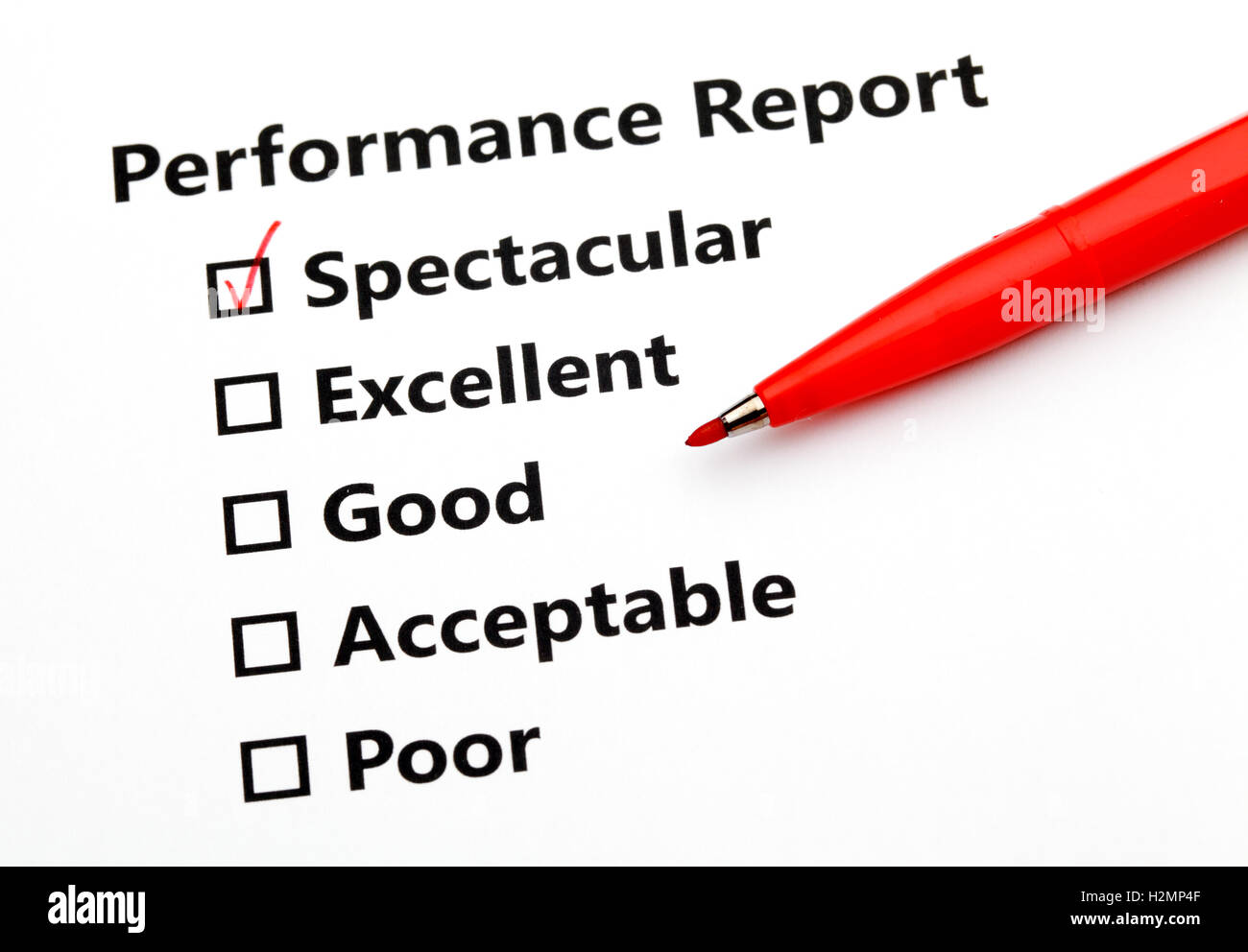 Performance report and pen Stock Photo - Alamy