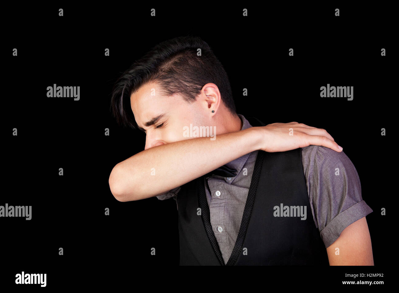 Sneezing into arm hi-res stock photography and images - Alamy