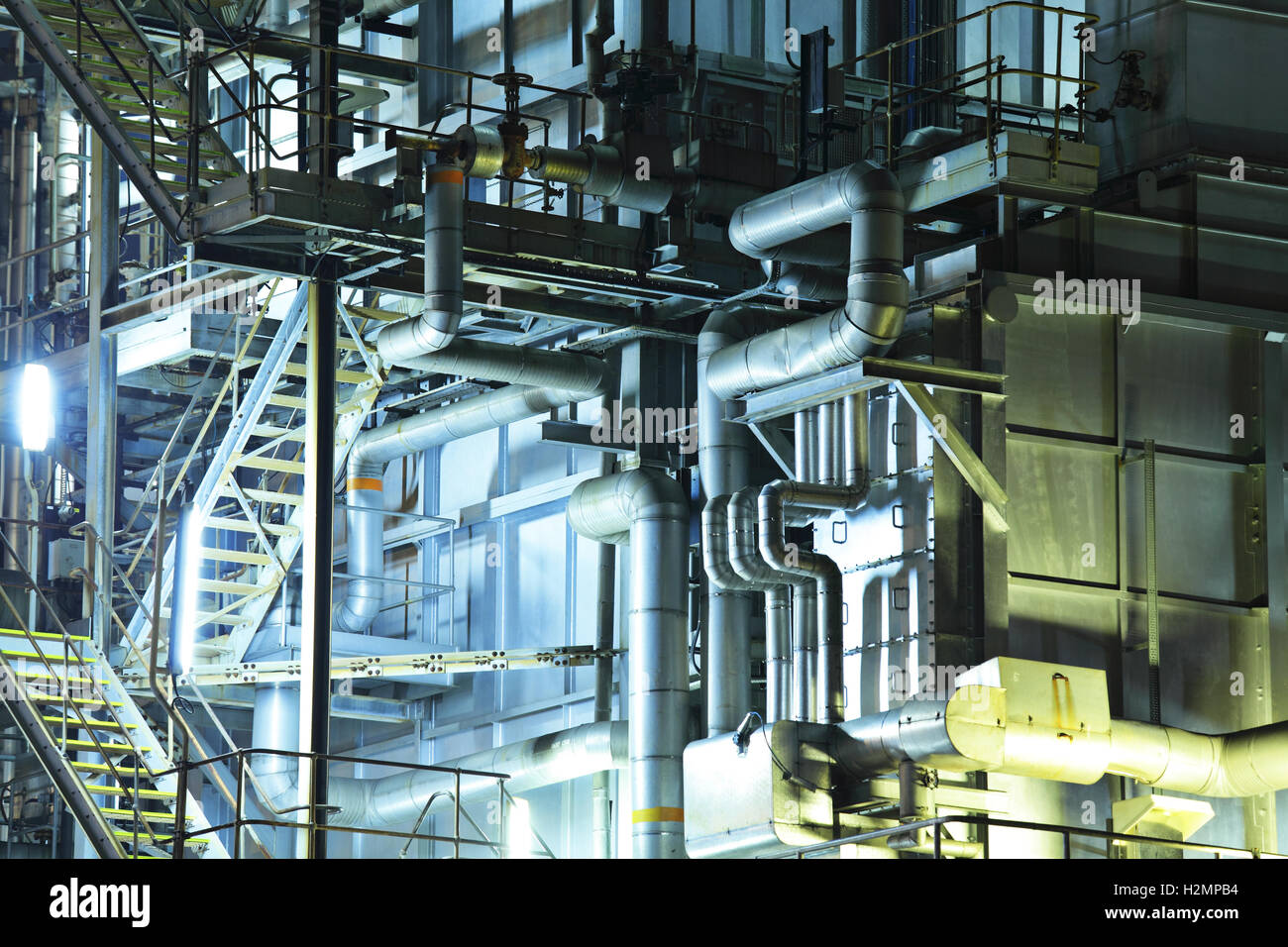 Industrial building at night Stock Photo - Alamy
