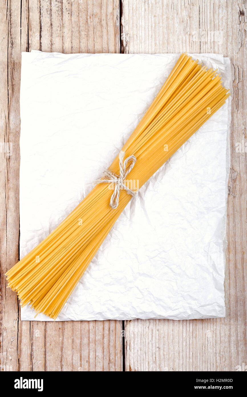 spaghetti on white paper Stock Photo - Alamy