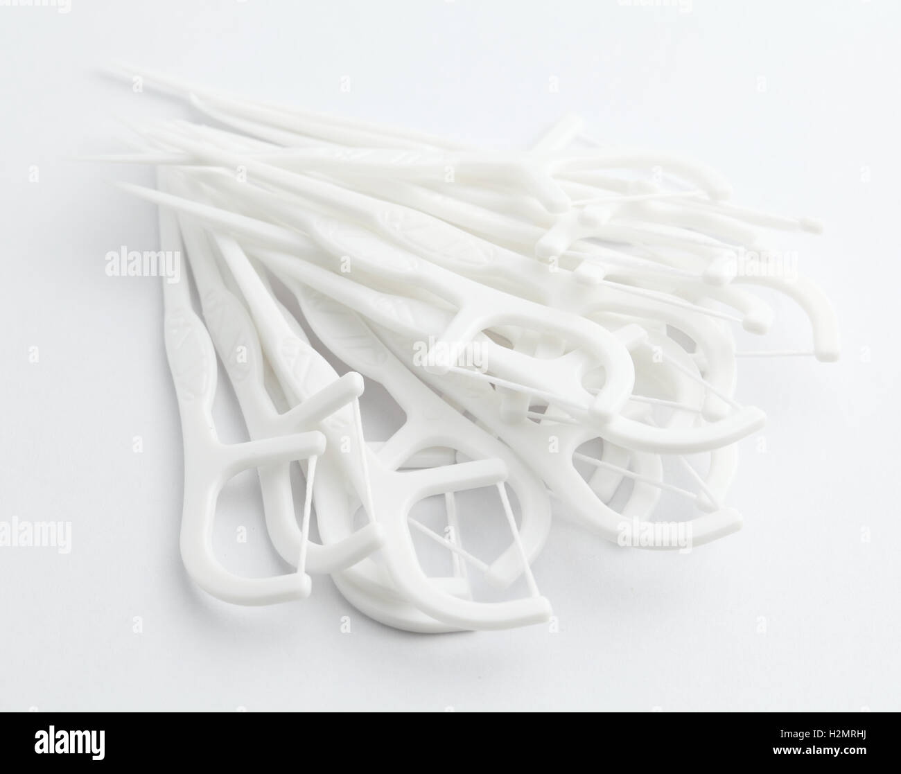 Plastic dental floss pick hi-res stock photography and images - Alamy
