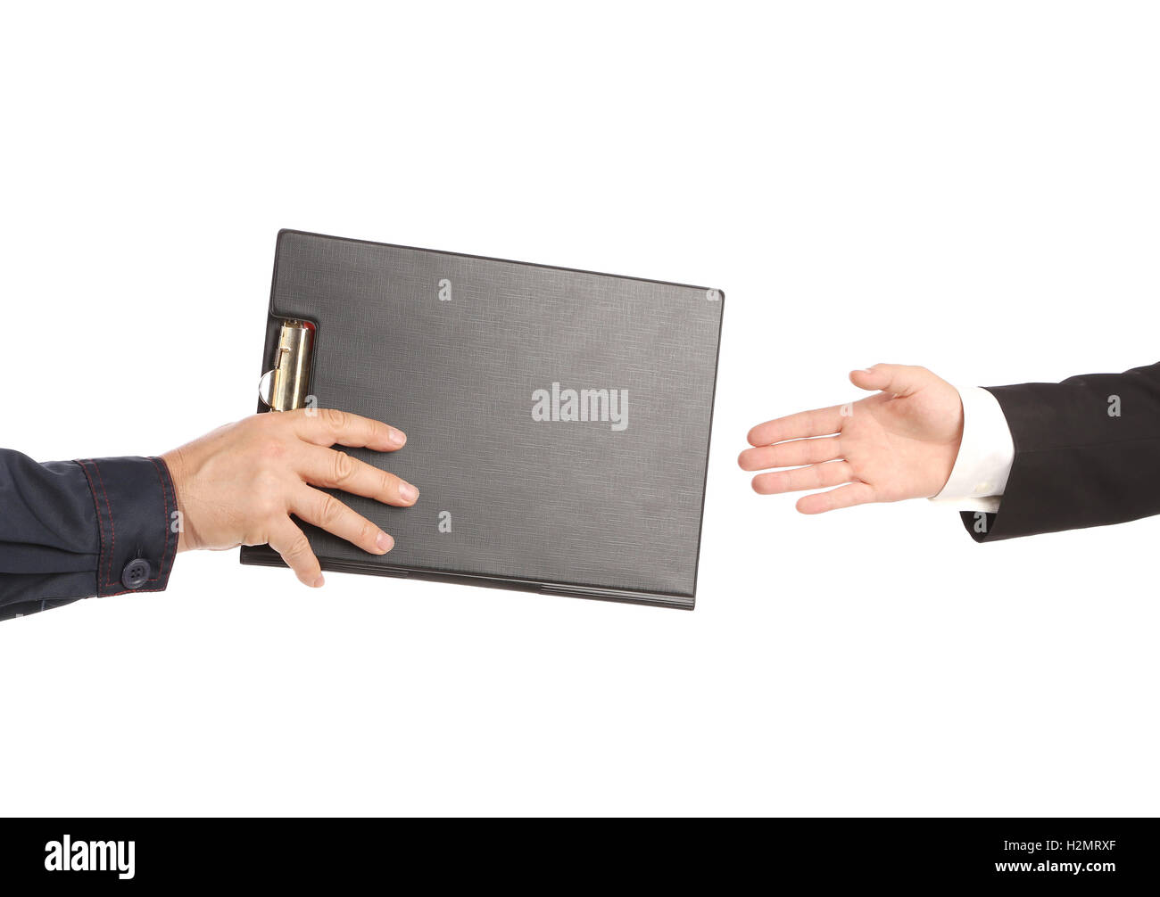 Hand giving a folder Stock Photo - Alamy