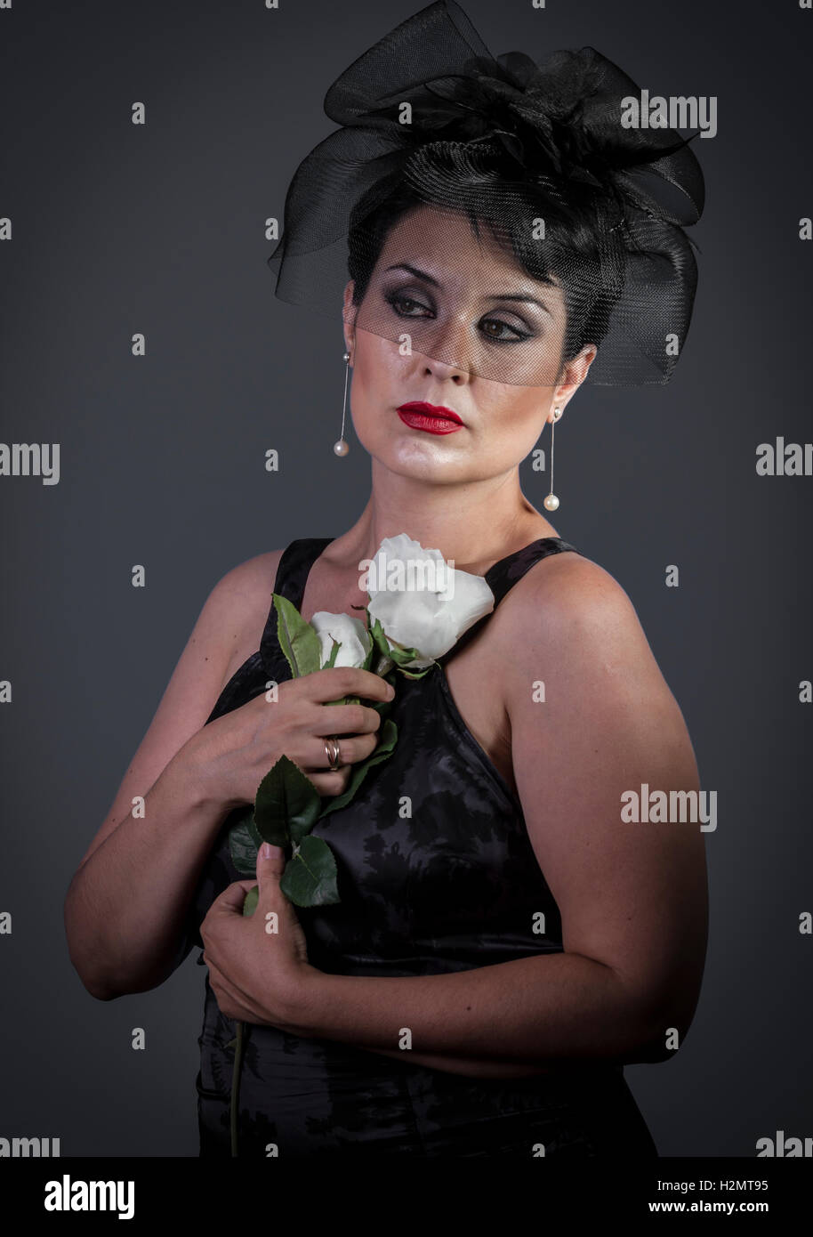 religion.Widow At Funeral. Beautiful retro woman Stock Photo - Alamy