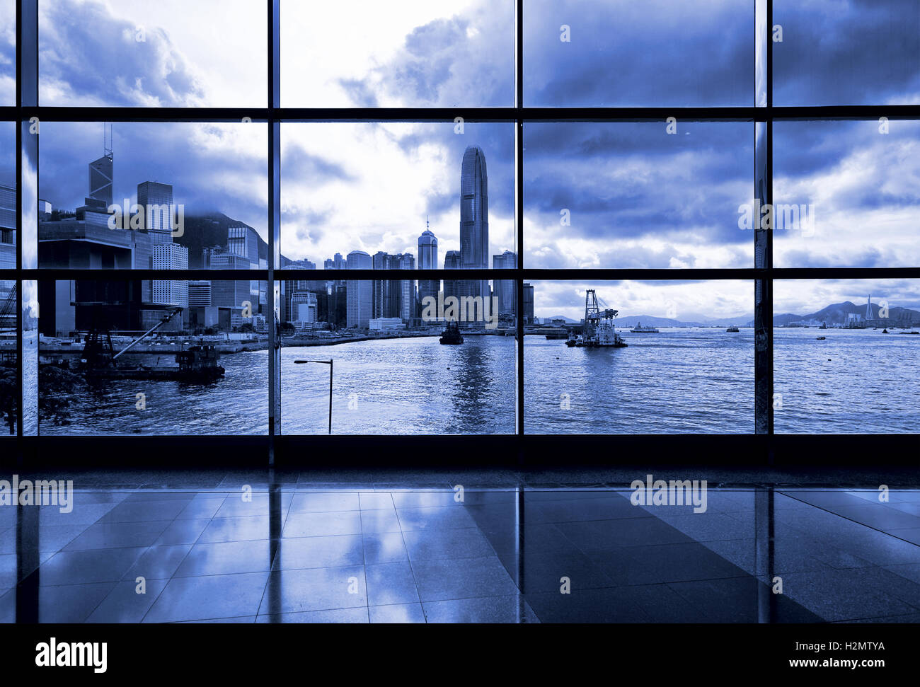 Modern interior with city view Stock Photo - Alamy