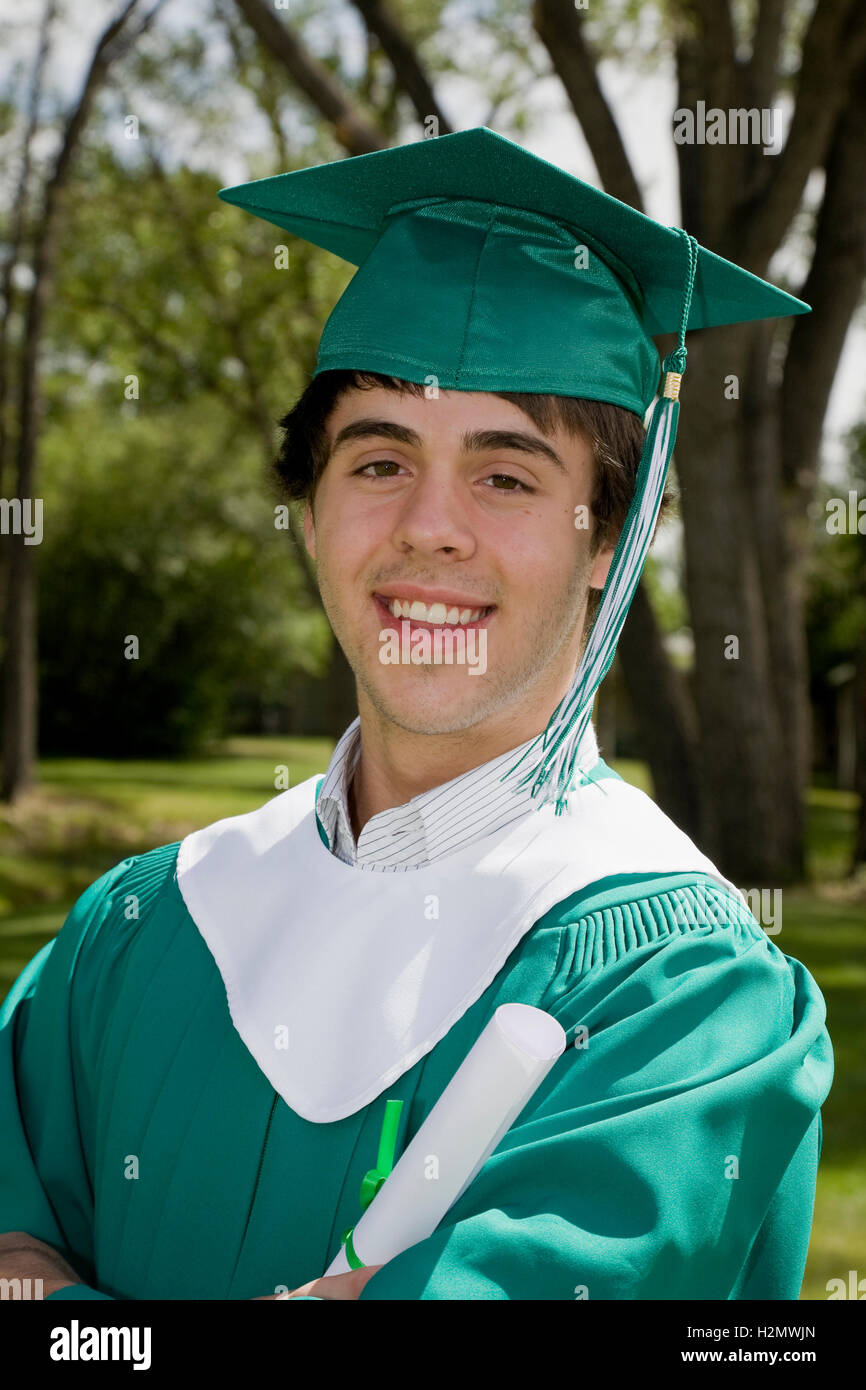 Smiling Graduate Boy Stock Photo - Alamy