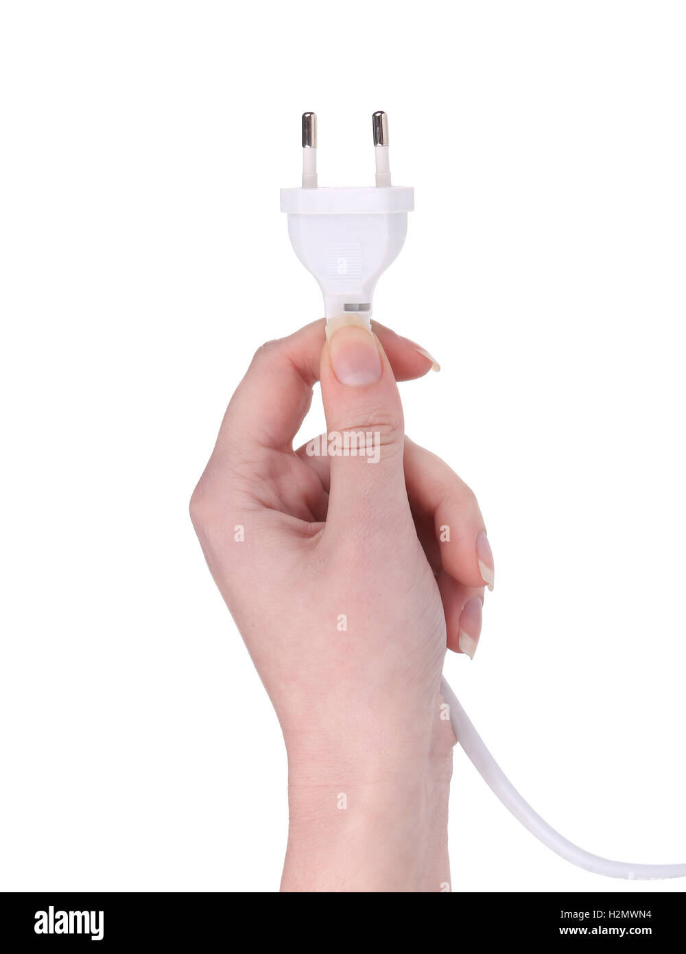 Hand holds electric plug Stock Photo - Alamy