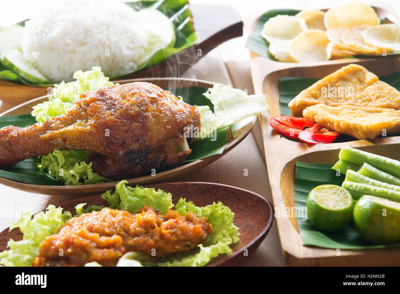 Popular Indonesia fried chicken rice Stock Photo - Alamy