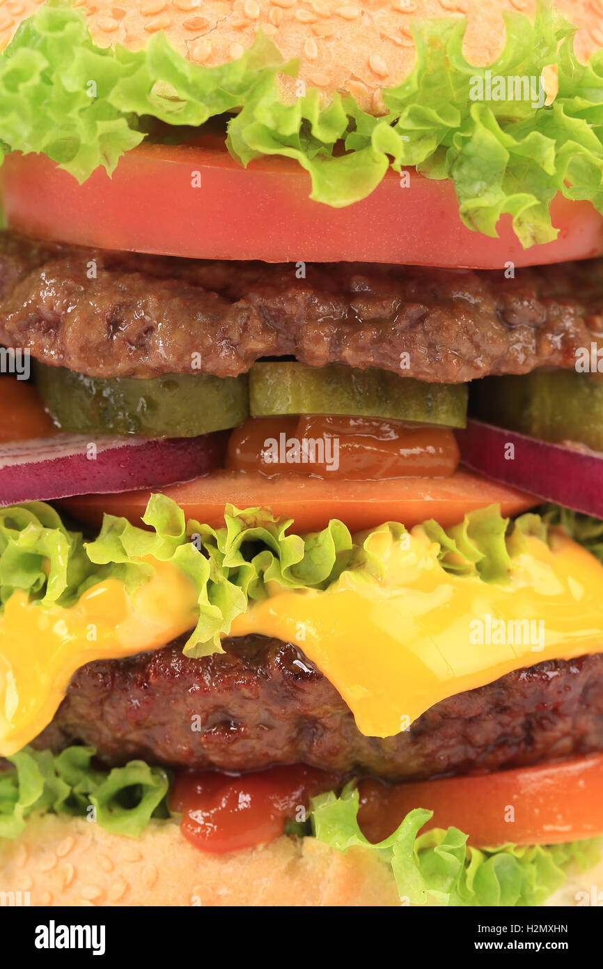 Closeup of cheeseburger Stock Photo - Alamy
