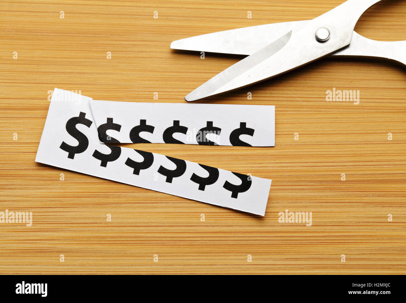 Expense cutting hi-res stock photography and images - Alamy