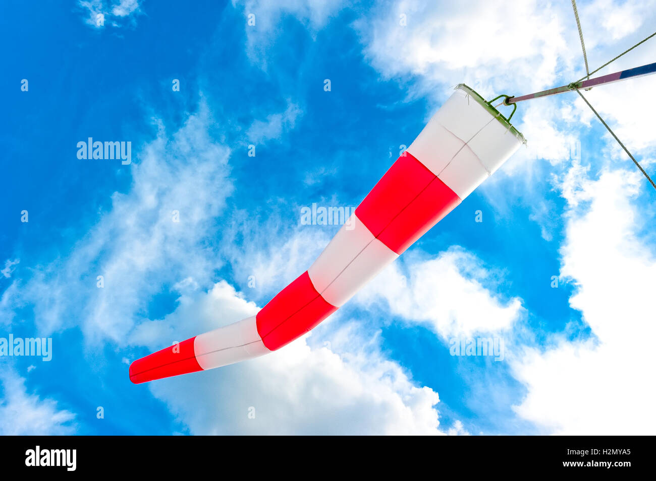 blue sky and striped windsock Stock Photo - Alamy