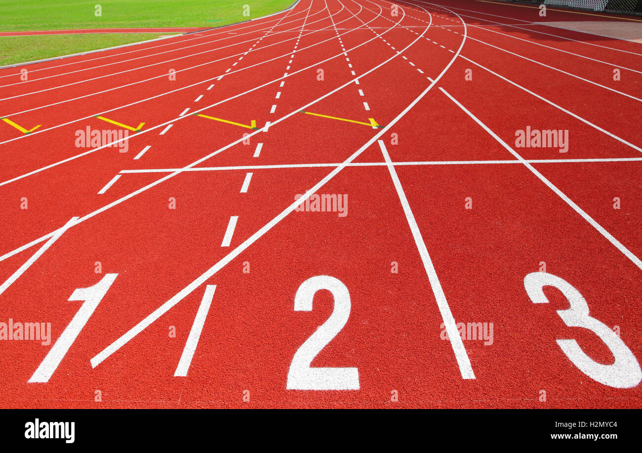 Red running track with number Stock Photo - Alamy
