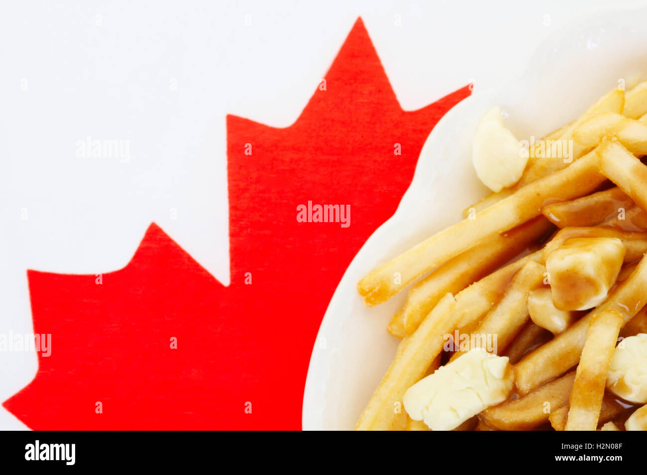 Poutine on Canadian flag Stock Photo - Alamy