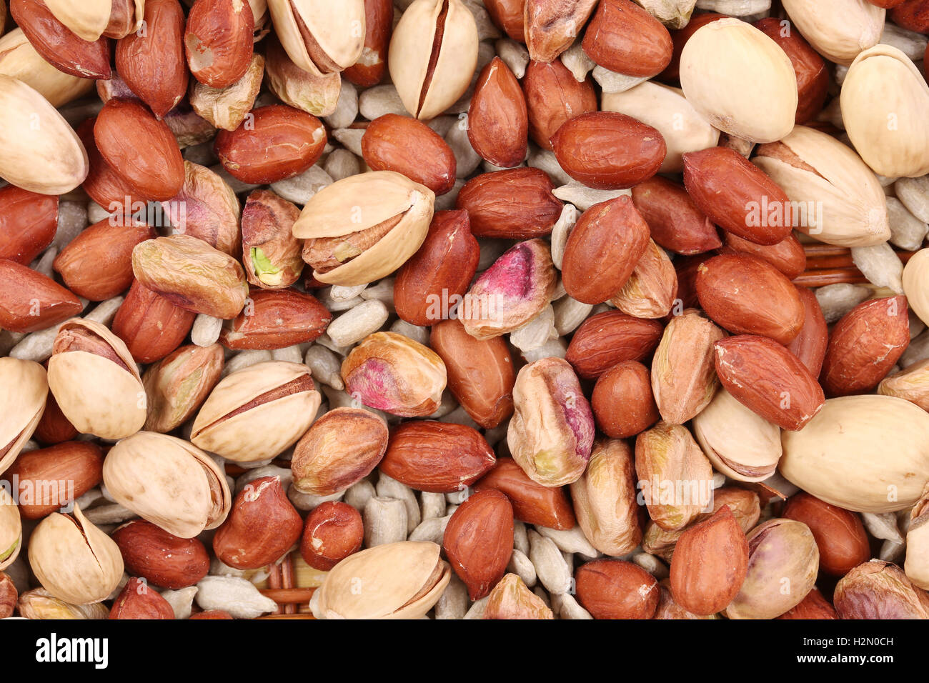 Background of different nuts Stock Photo - Alamy