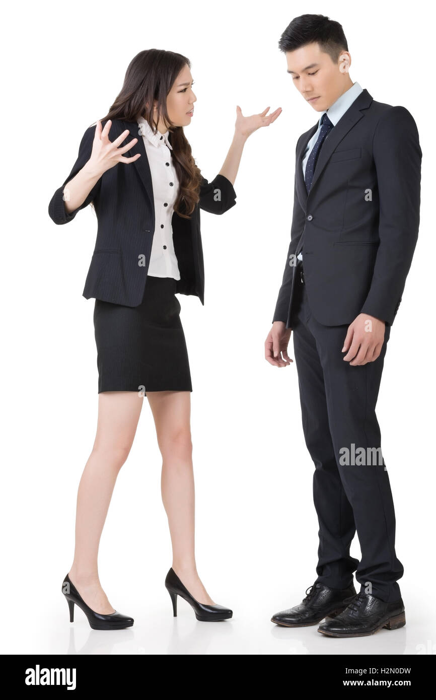 Angry business woman yelling to a man Stock Photo - Alamy