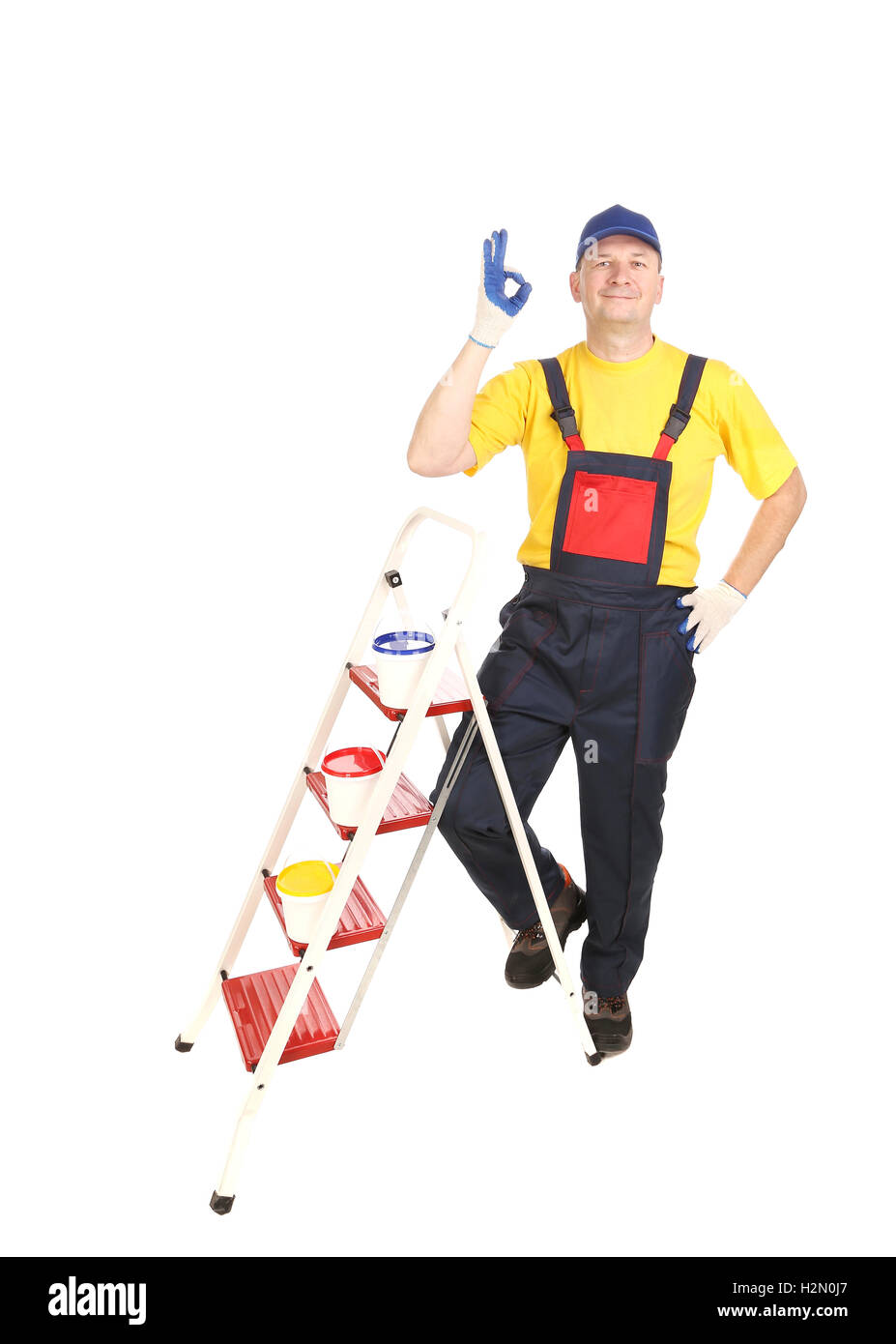 Worker on ladder with buckets Stock Photo - Alamy