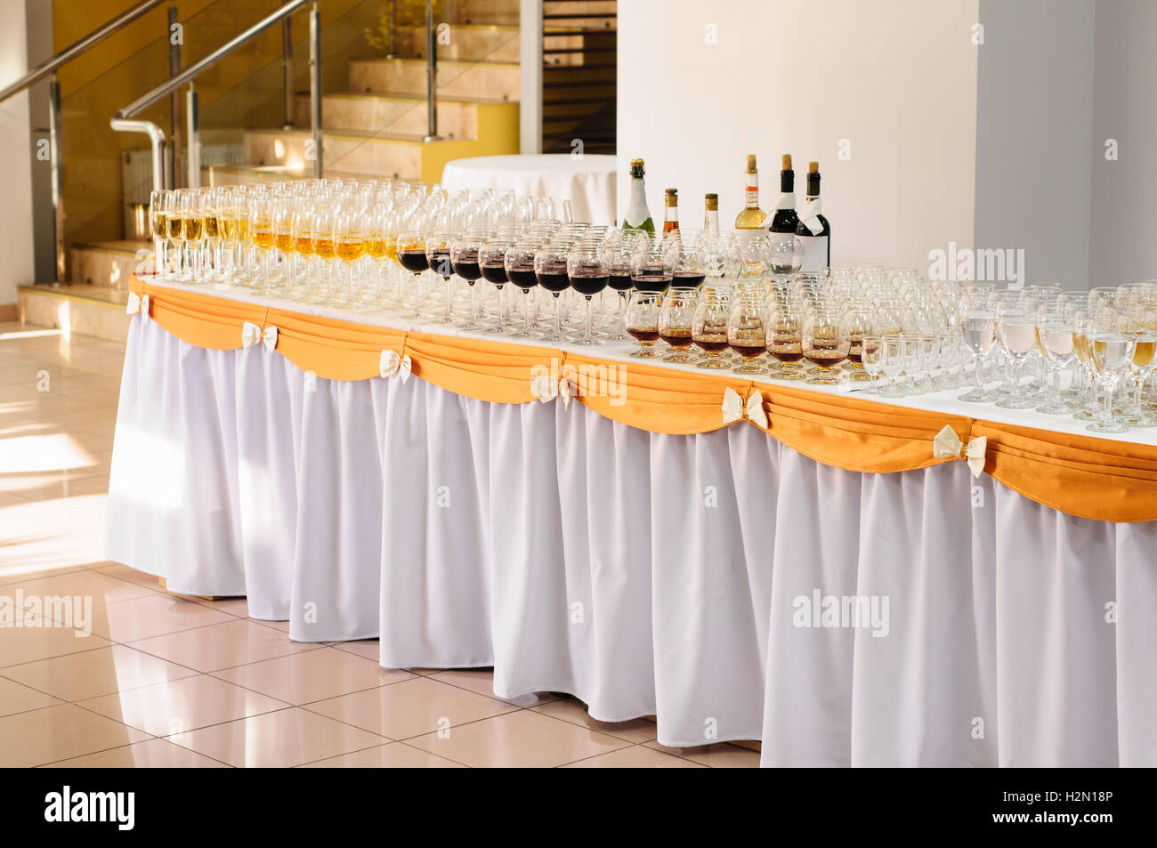 banquet table with alcohol drinks Stock Photo - Alamy