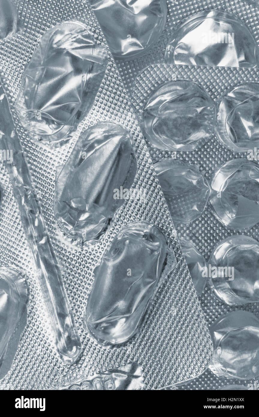 Empty pill blister background, multiple emptied tablet blisters silver ...