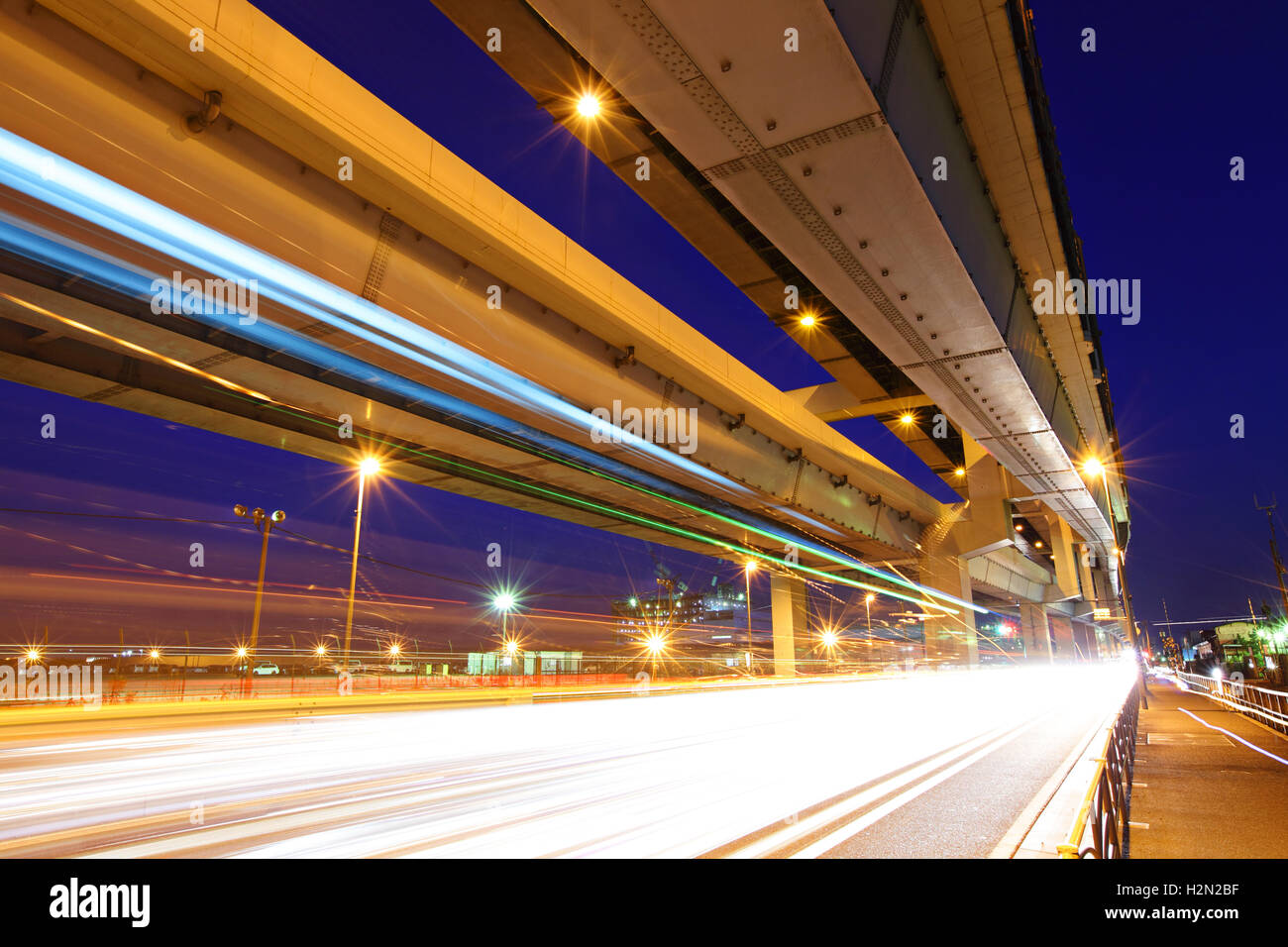 Elevated freeway with traffic trail Stock Photo - Alamy