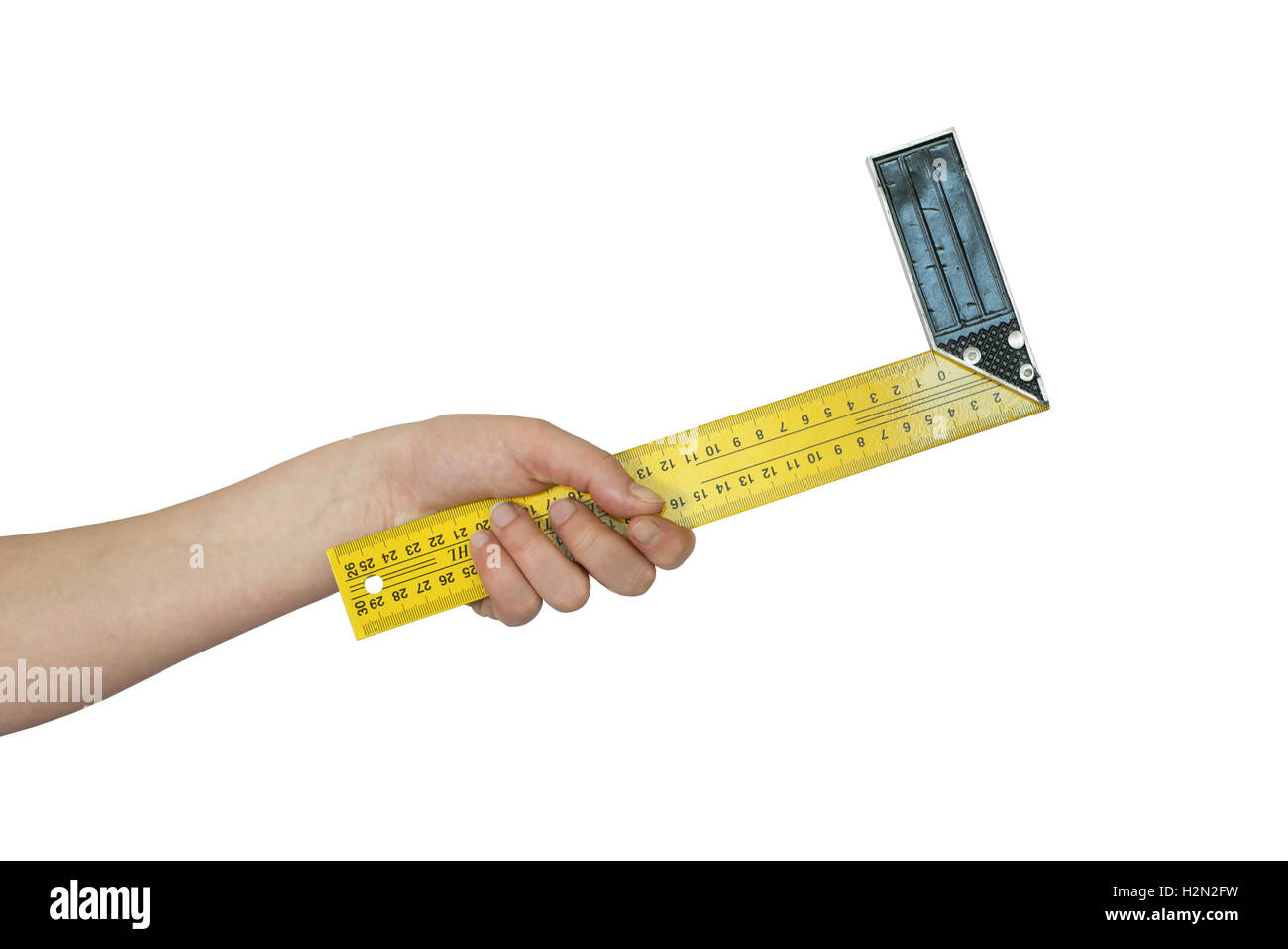 Hand holds the angular ruler Stock Photo - Alamy