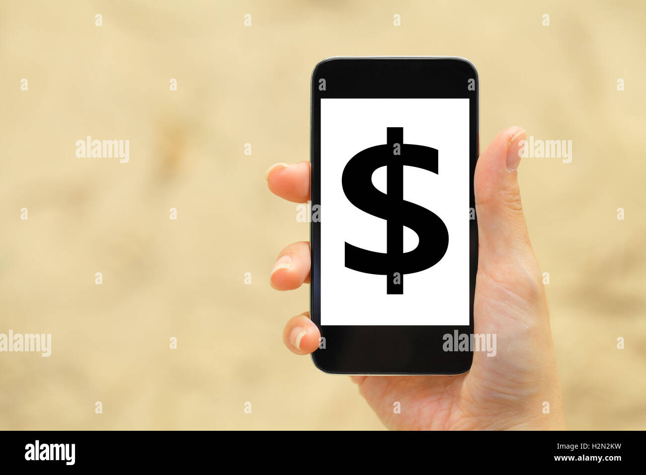 Dollar sign on mobile phone Stock Photo - Alamy