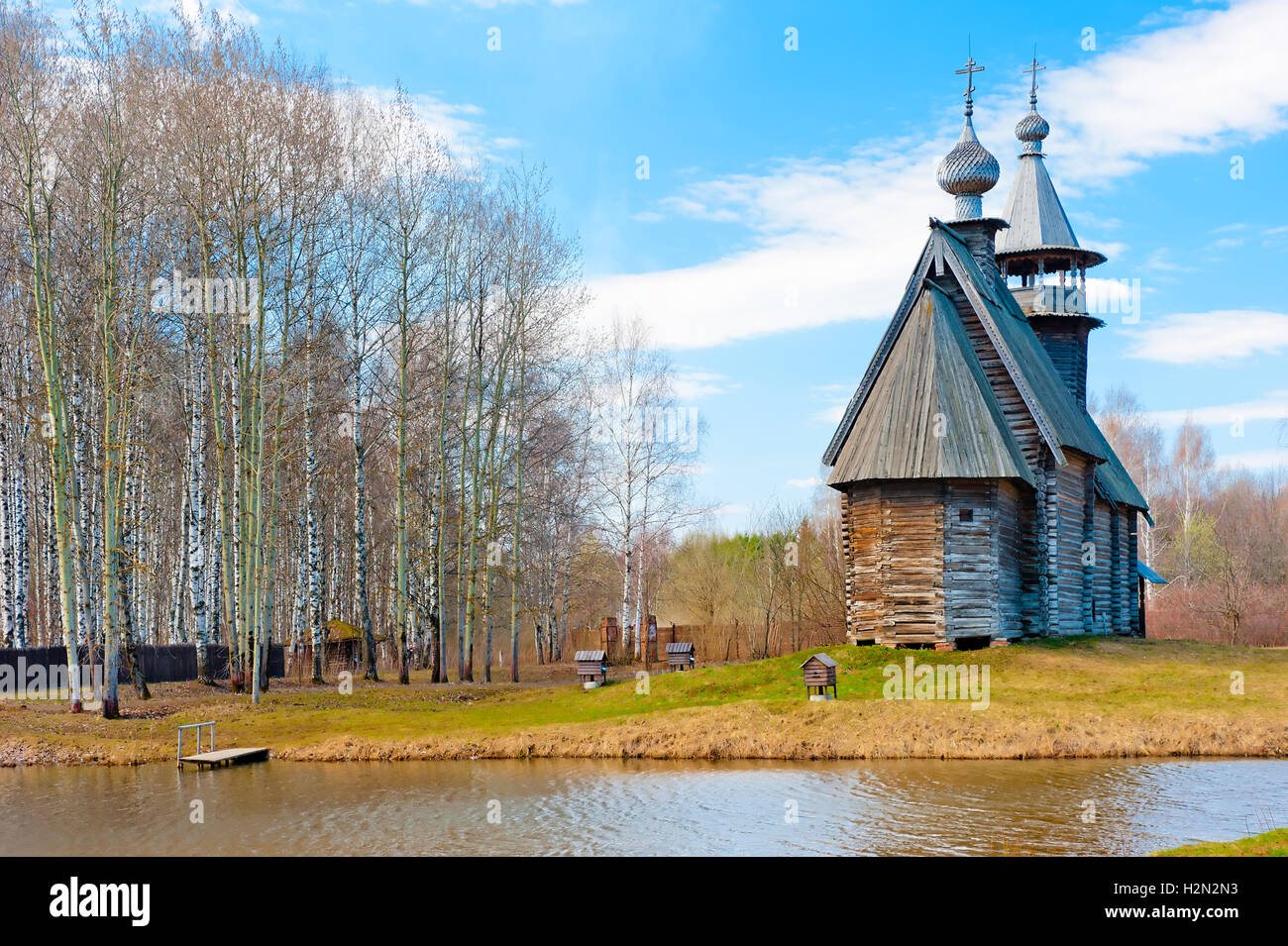 beautiful rural landscape with wooden church Stock Photo - Alamy