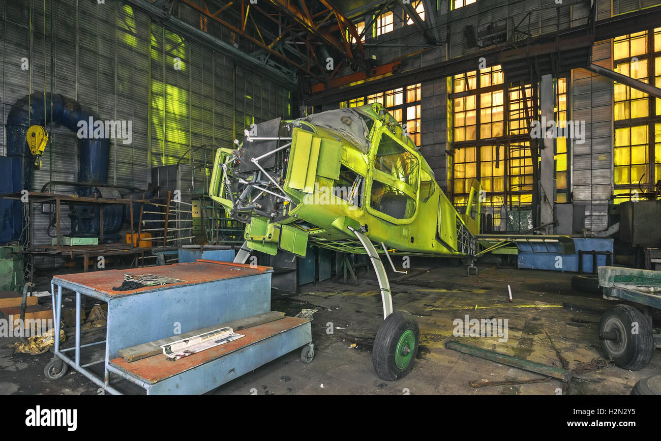 Abandoned aviation factory of small aircraft. The partially-built ...