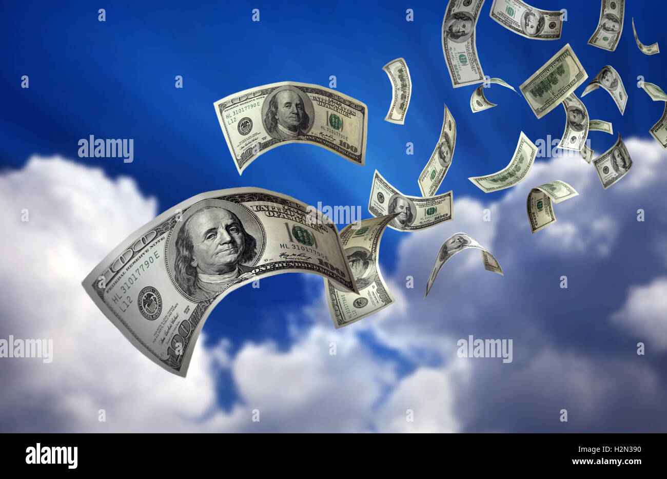 Falling Money $100 Bills Stock Photo - Alamy