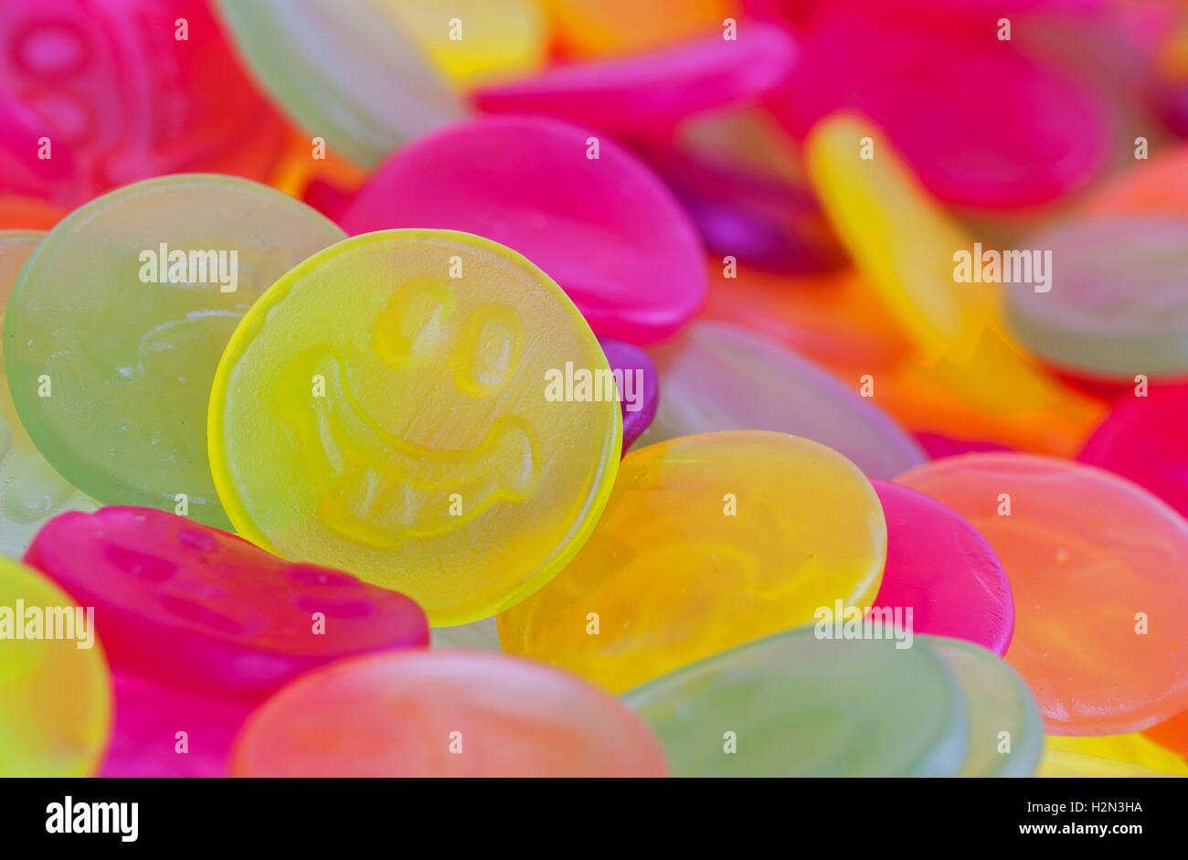 Colorful candy faces Stock Photo - Alamy