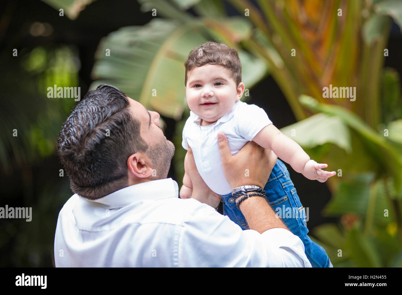 Father lifting his son hi-res stock photography and images - Alamy
