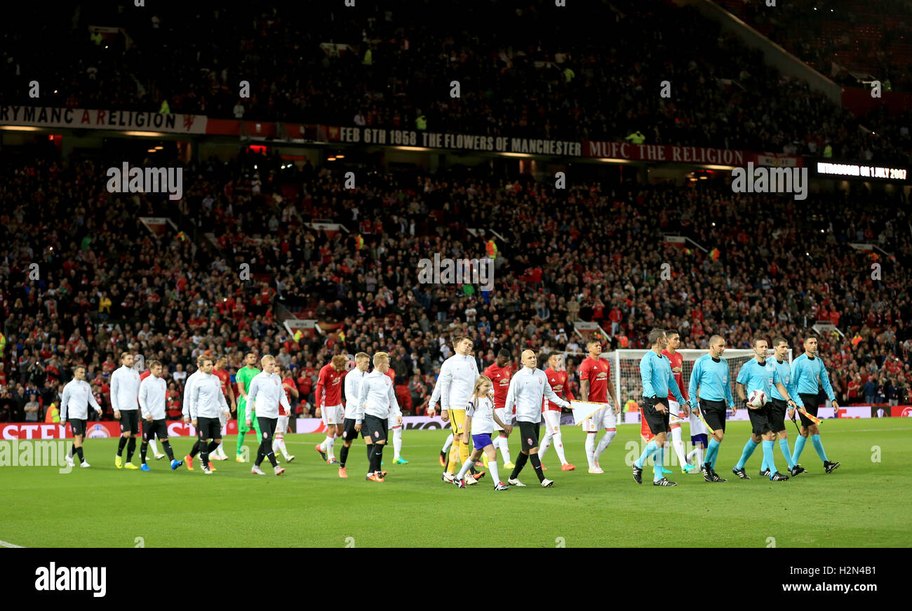 The two teams walk out before kick-off during the UEFA Europa League ...