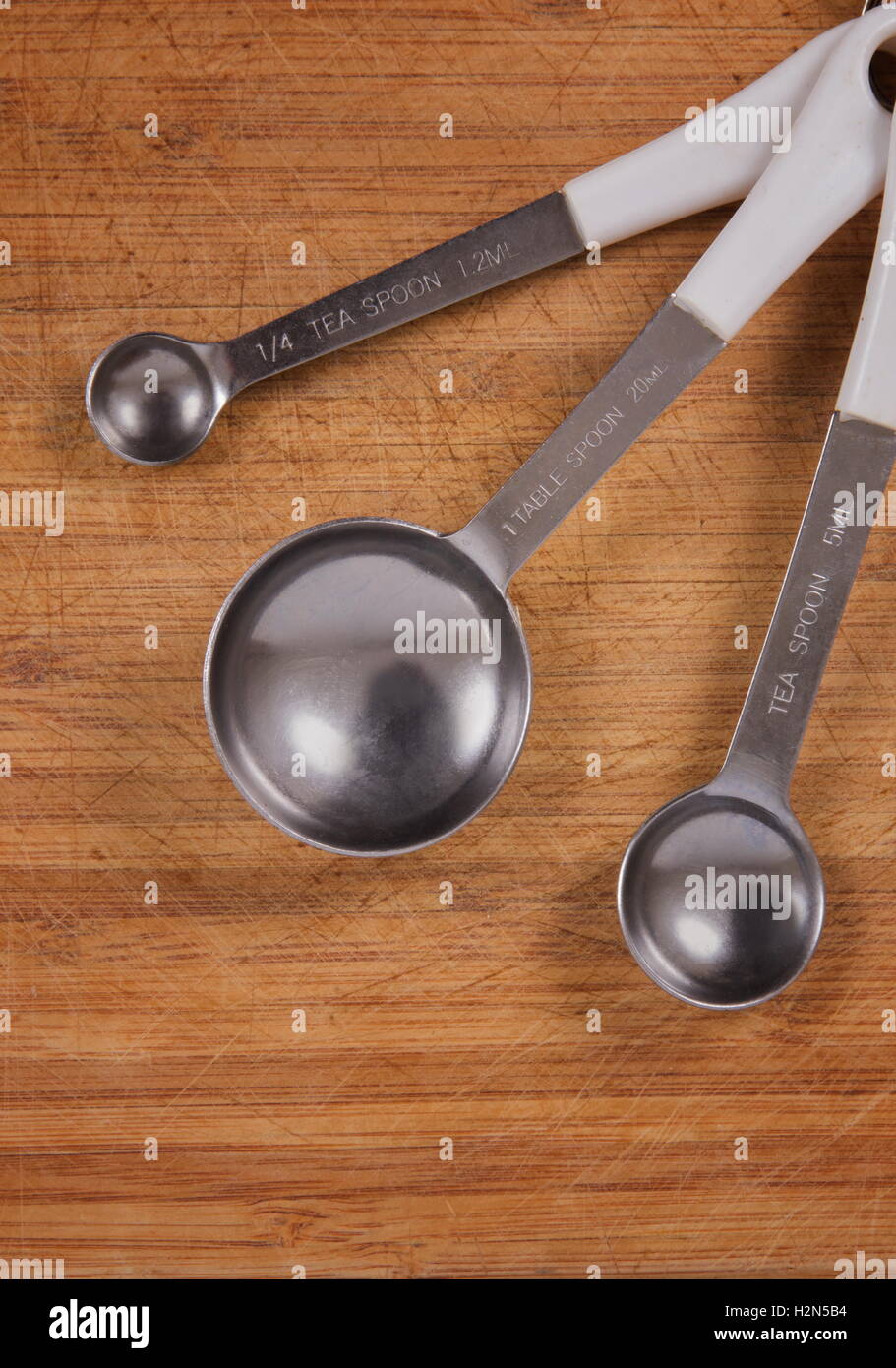 Closeup three silver spoons hi-res stock photography and images - Alamy