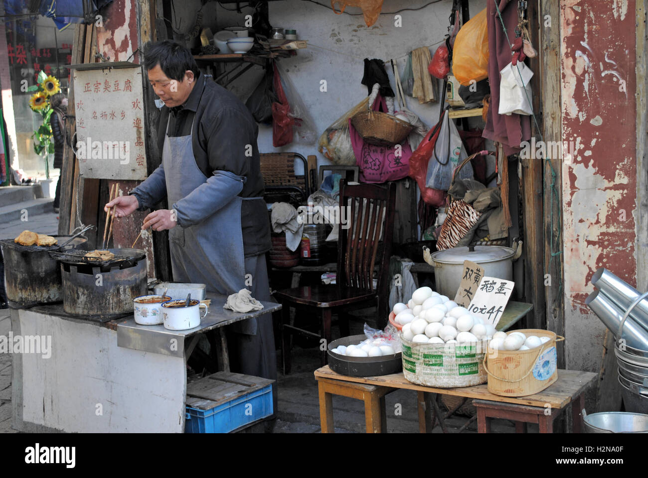 A Chinese man selling breakfast in Tongli, a famous water town in ...