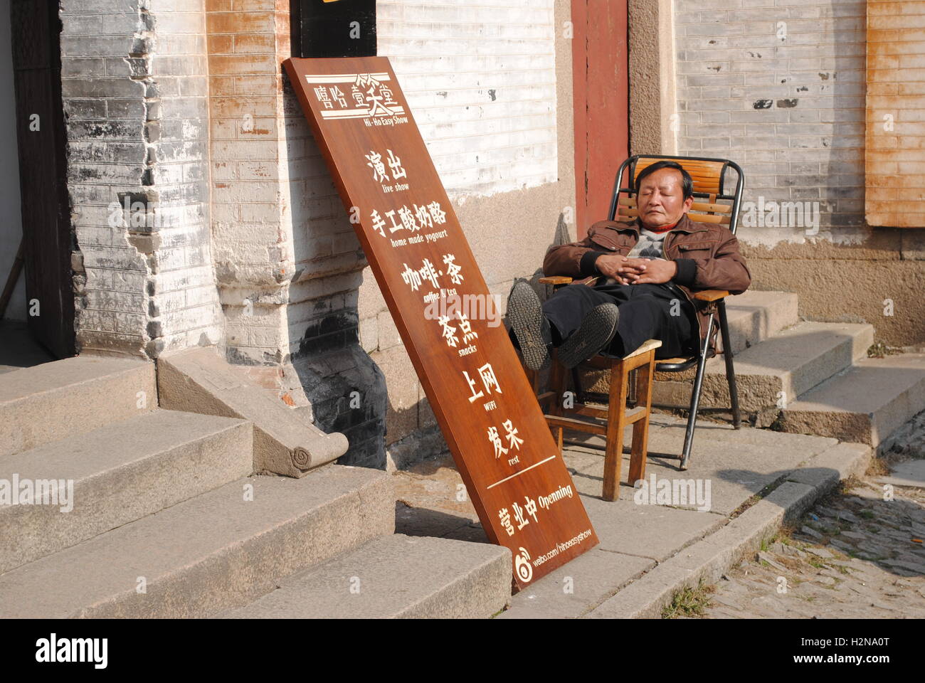 Chinese man takes daytime nap outside in the famous water town of ...