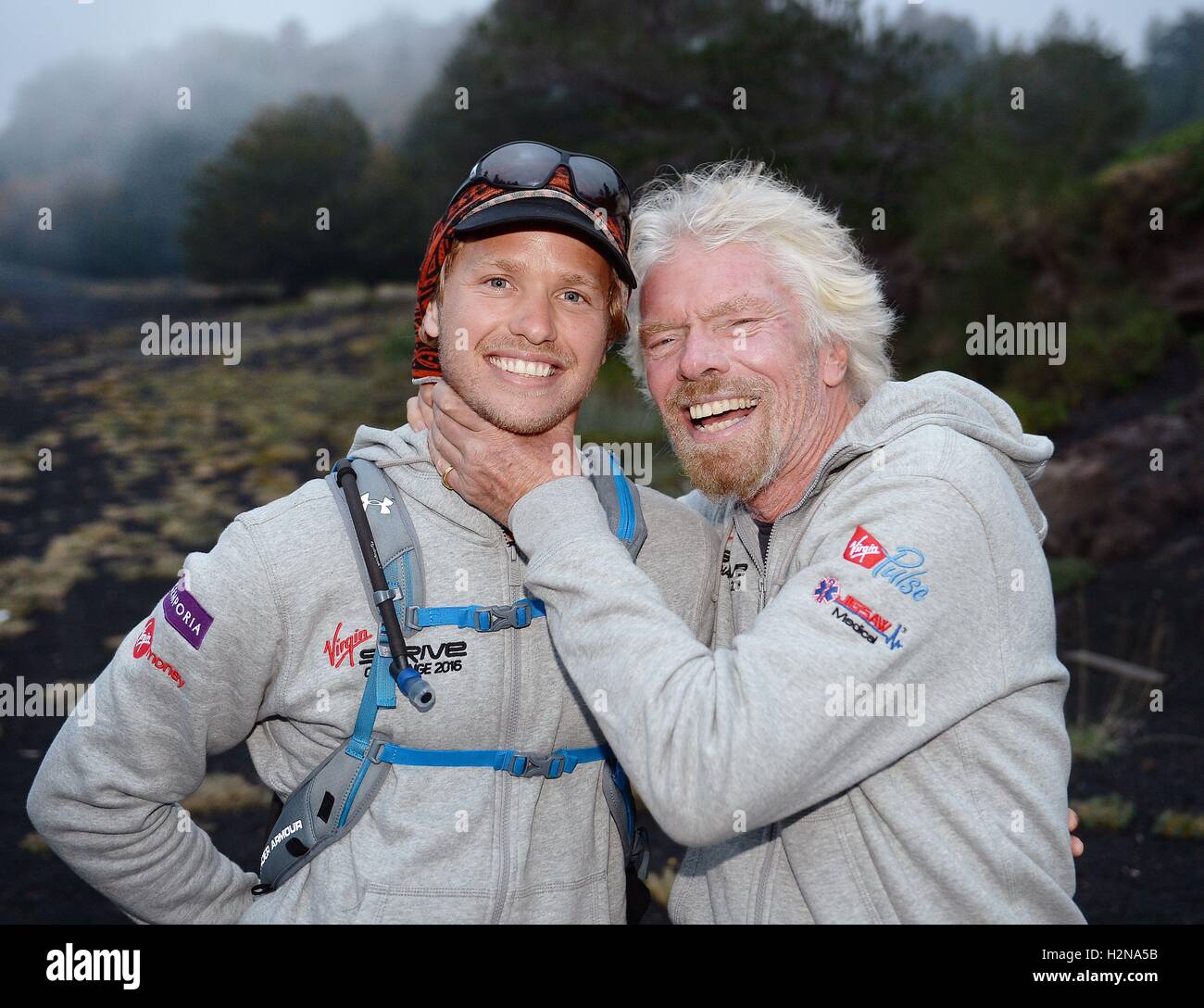 Sam Branson and Sir Richard Branson after completing the Virgin Strive ...