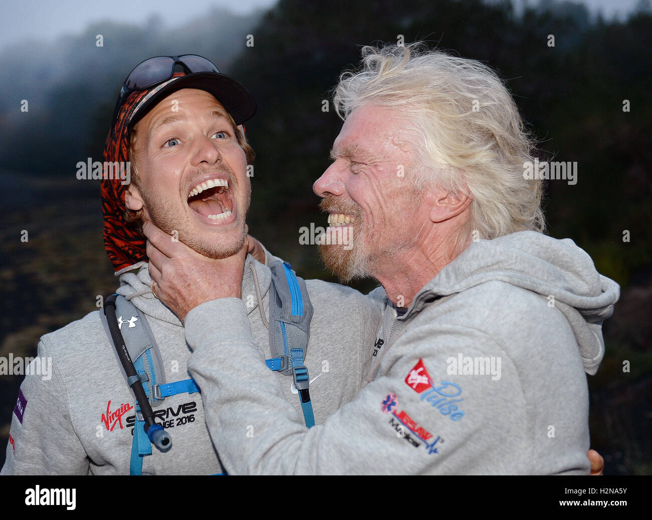 Sam Branson and Sir Richard Branson after completing the Virgin Strive ...