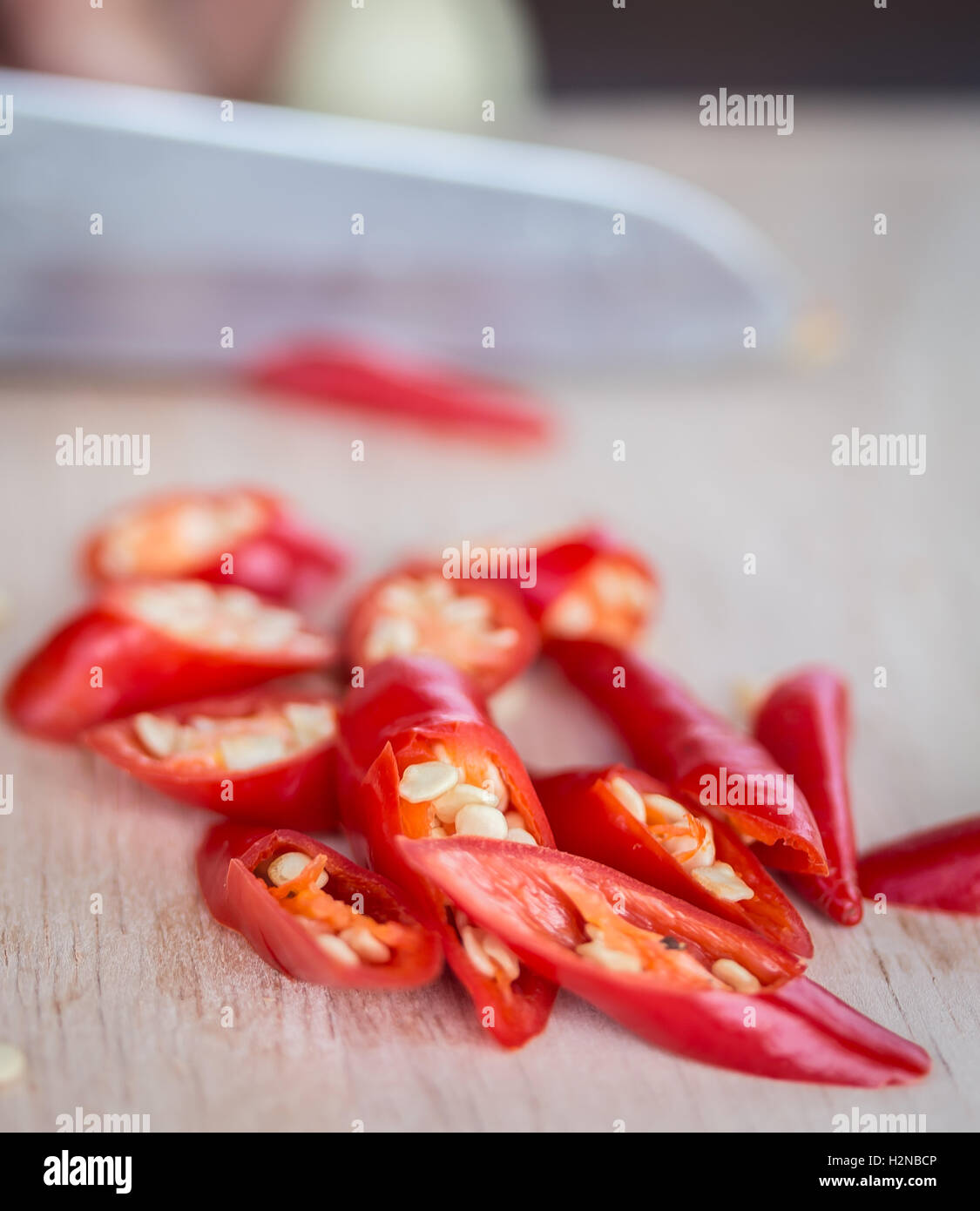 Chillies Being Chopped Showing Chili Pepper And Flavoring Stock Photo ...