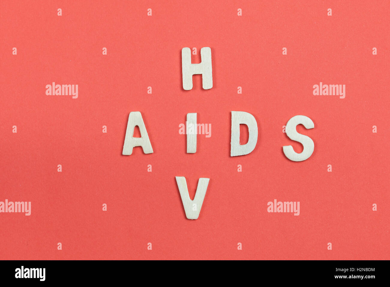 HIV and AIDS Puzzle on Red Blood Background Stock Photo - Alamy