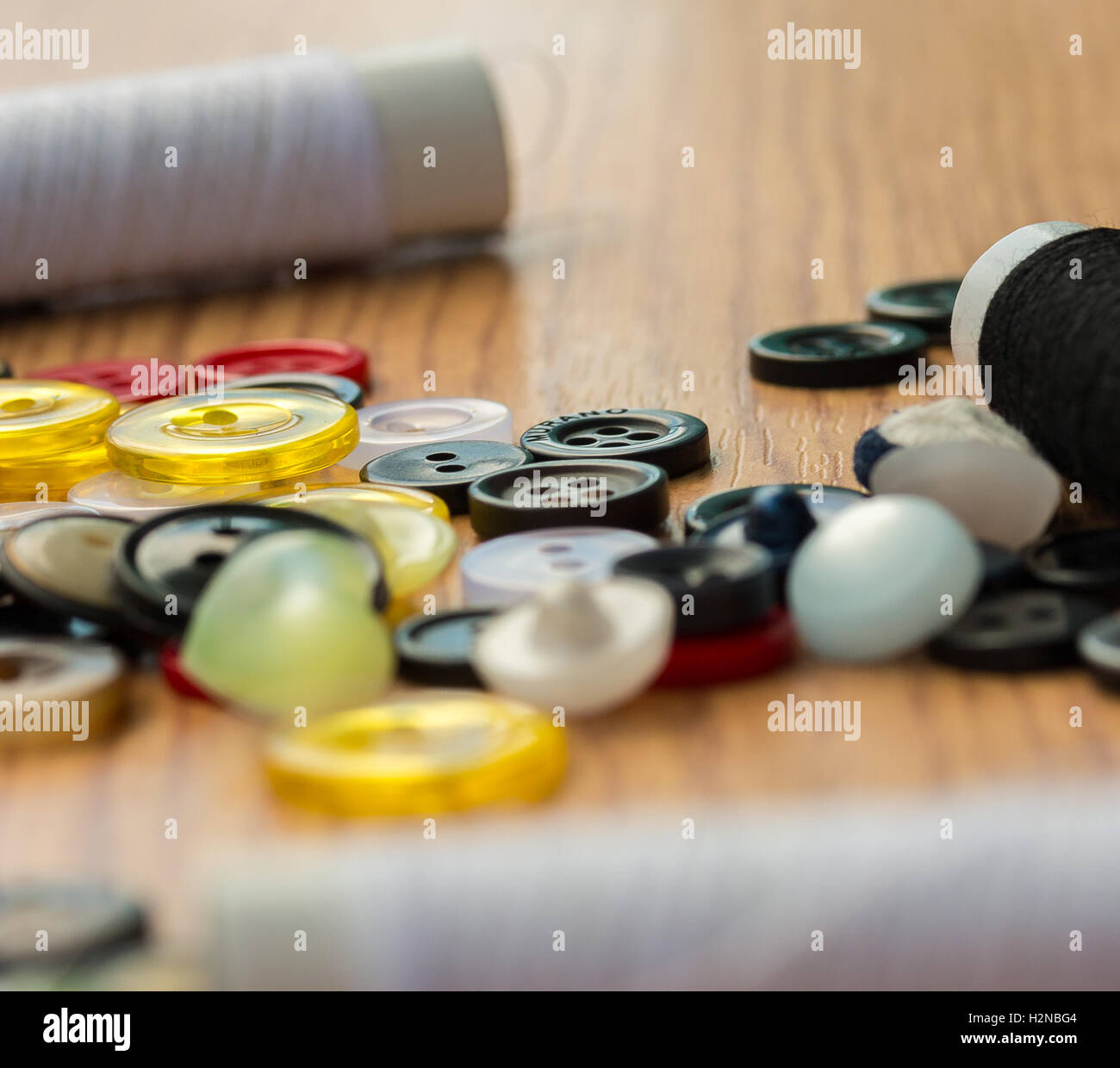 Assorted Buttons Indicating Sewing Assortment And Sew Stock Photo - Alamy