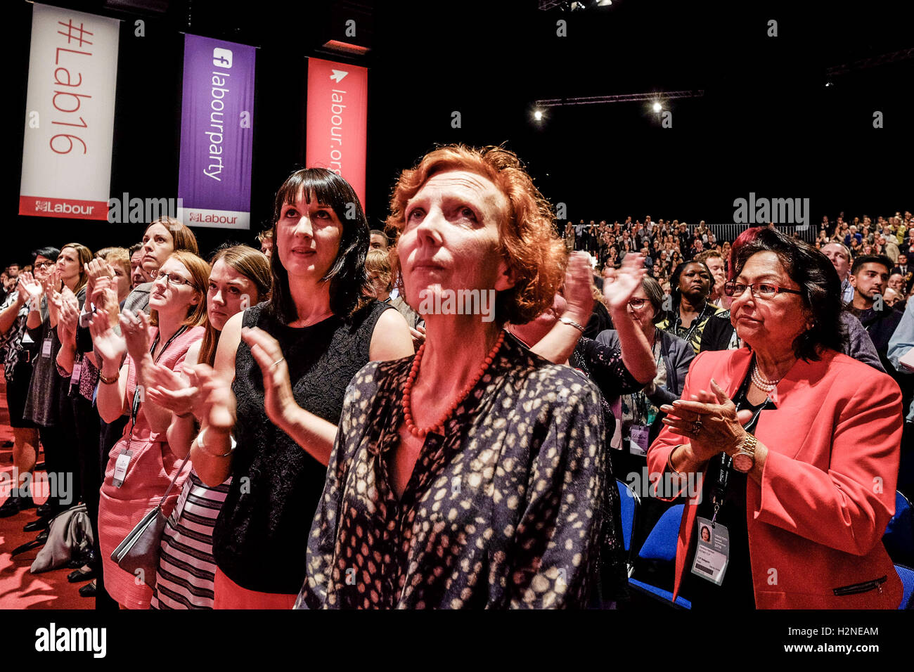Delegates stand hi-res stock photography and images - Alamy