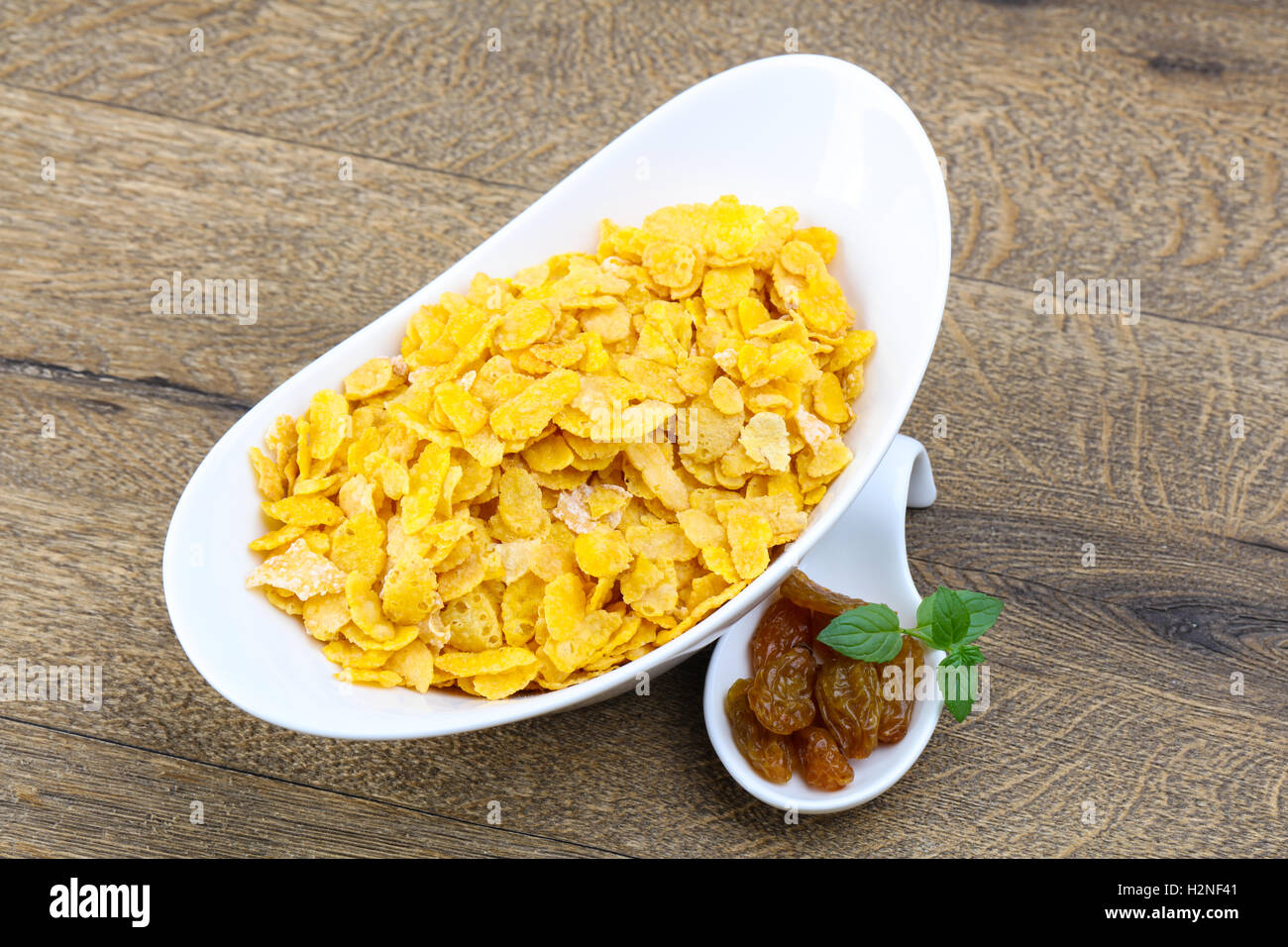 Corn flakes with raisin - dietary fitness breakfast Stock Photo - Alamy